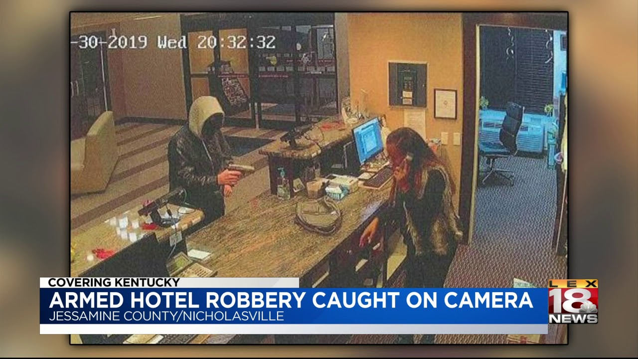 Armed hotel robbery caught on camera - YouTube