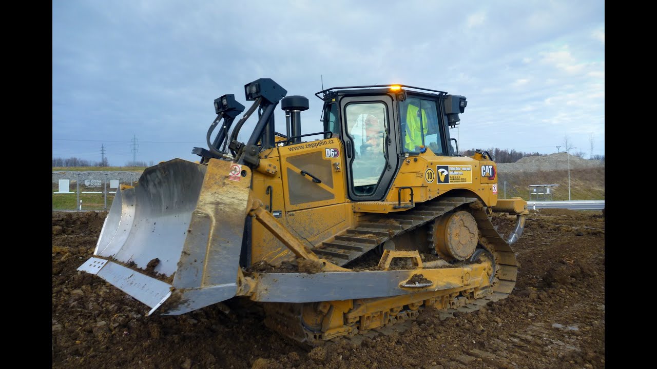 NEW CAT D6XE pushing soil - YouTube