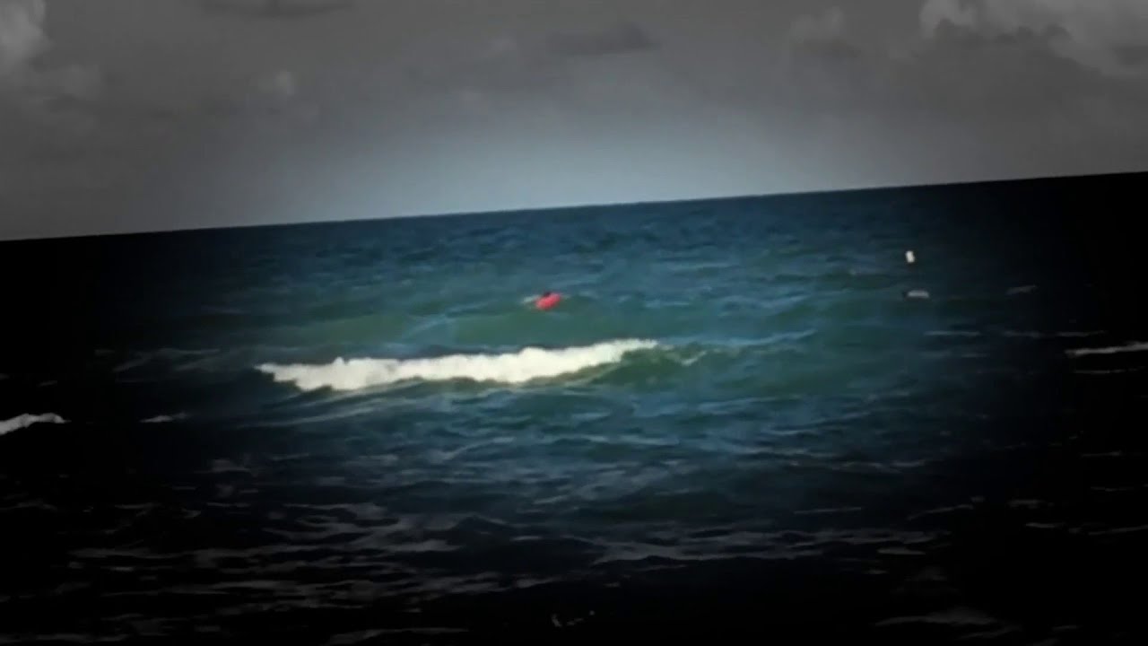 Rip currents pull family out to sea in Miami Beach - YouTube