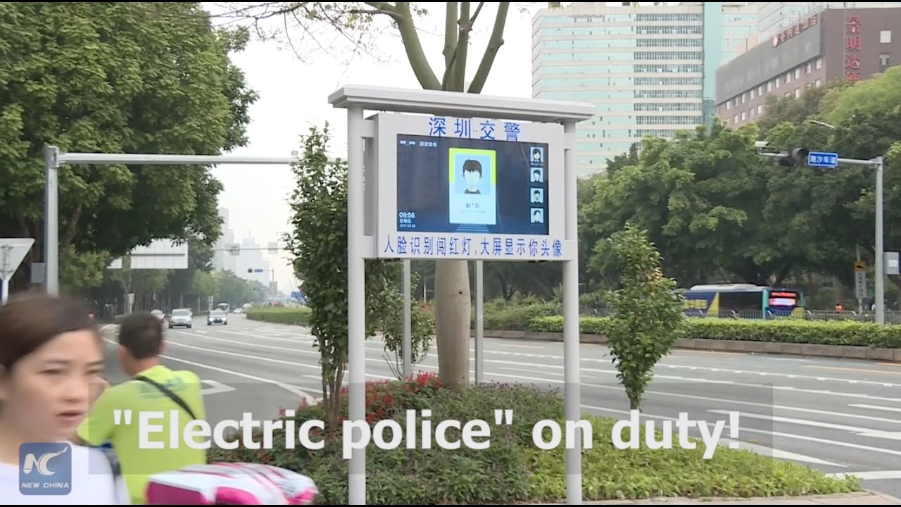 "Electric police" helps to stop red light running - YouTube