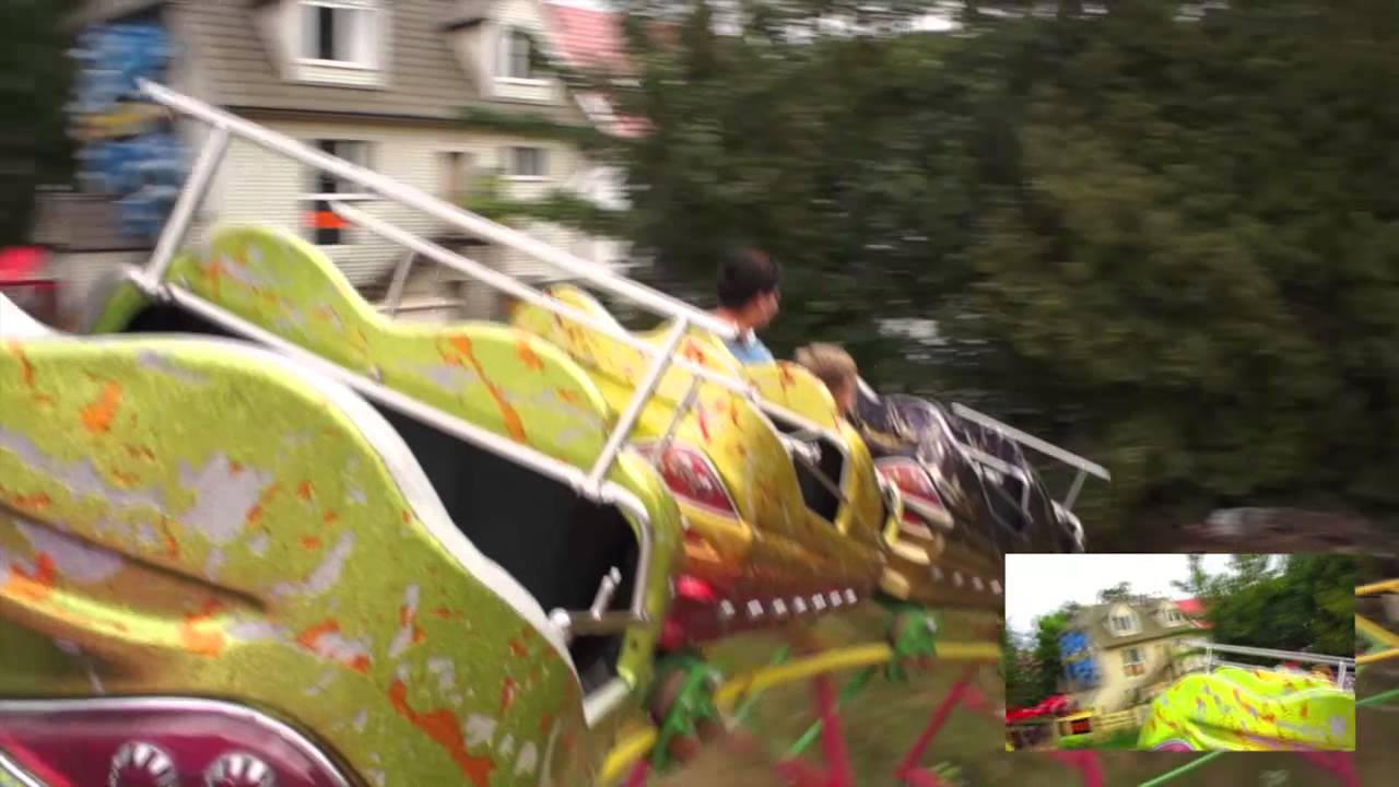 Amusement park kids roller coaster filmed handheld with 3-axis gimbal ...