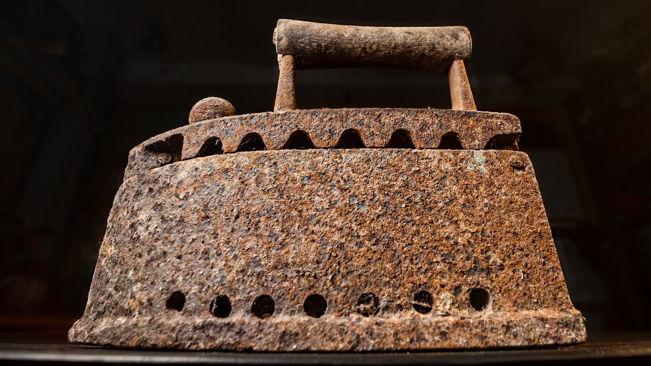 Restoration of a rusted charcoal iron from 1940 - YouTube