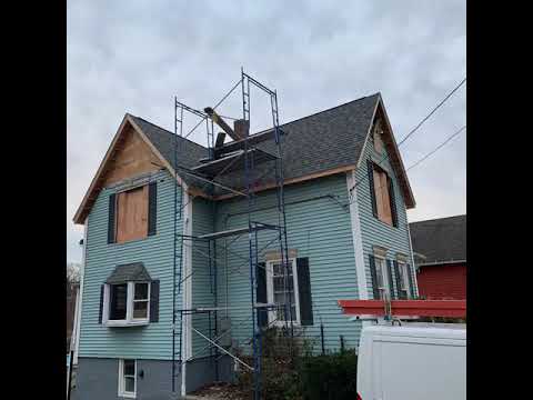 Spraying Zinsser BIN to seal in soot and smoke damage from house fire