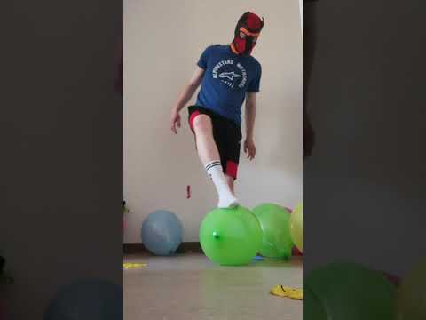 Loony Stomping some Smiley Balloons wearing Puppy Socks