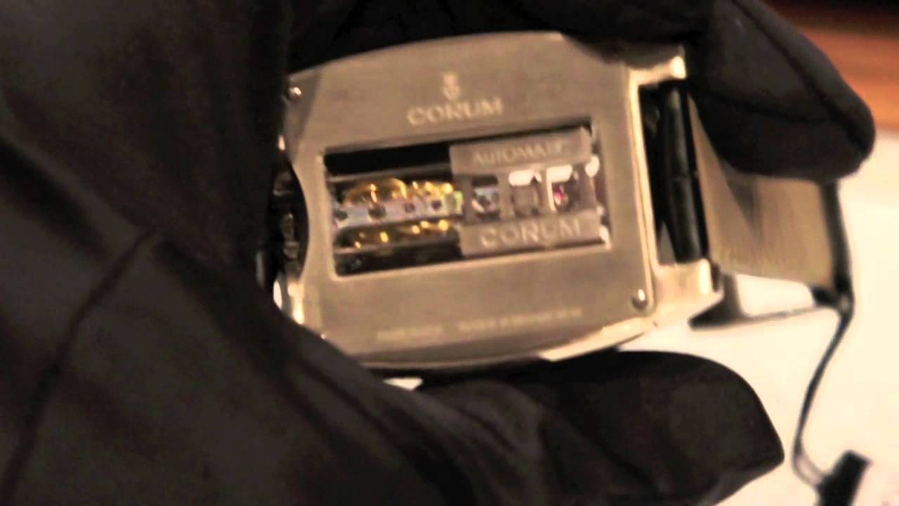 How to wind the Corum Golden Bridge Automatic - YouTube