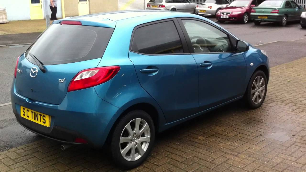 Mazda 2 with dark tints on all rear windows - YouTube