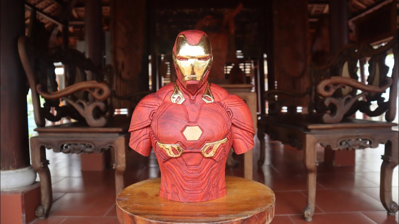 Watch an Artist Sculpt Iron Man from a Hunk of Wood