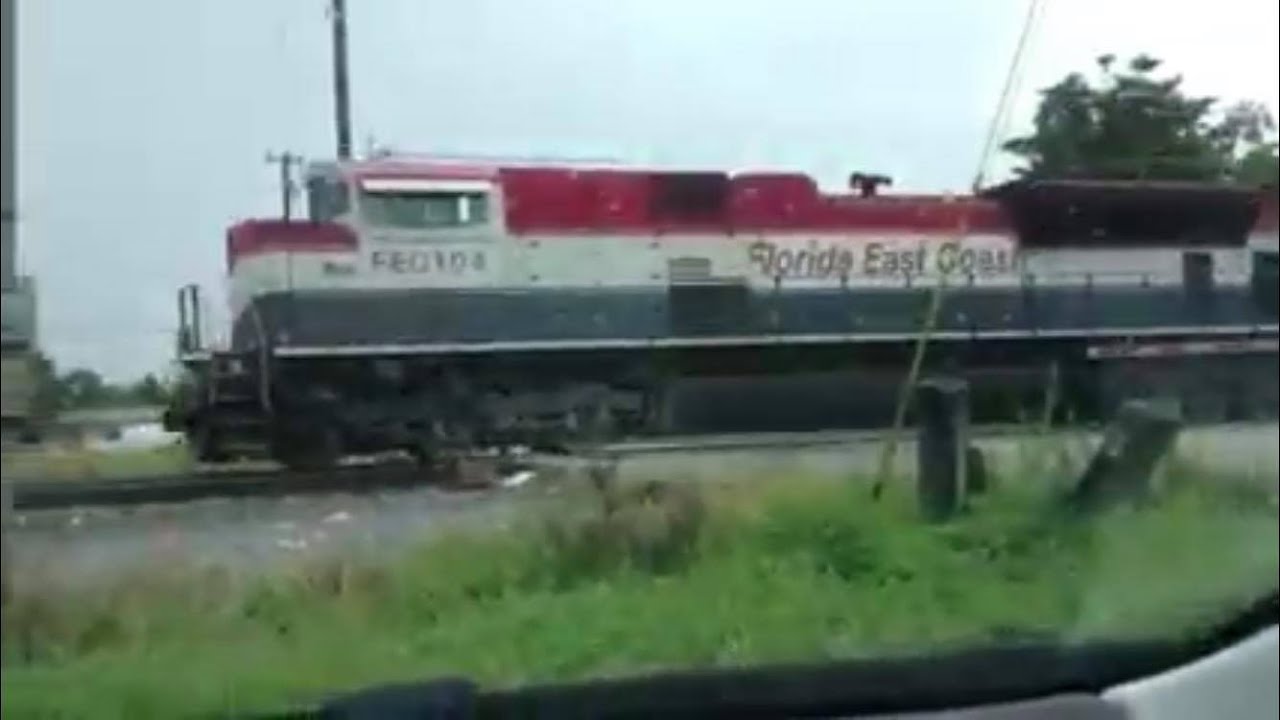 FEC train 202-27 with first FEC GP38-2 in-trail 7-27-13 - YouTube