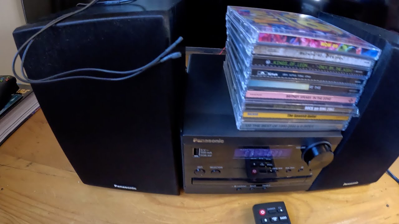 my first cd player system i got in 2024 + my cd's form charity shop's ...