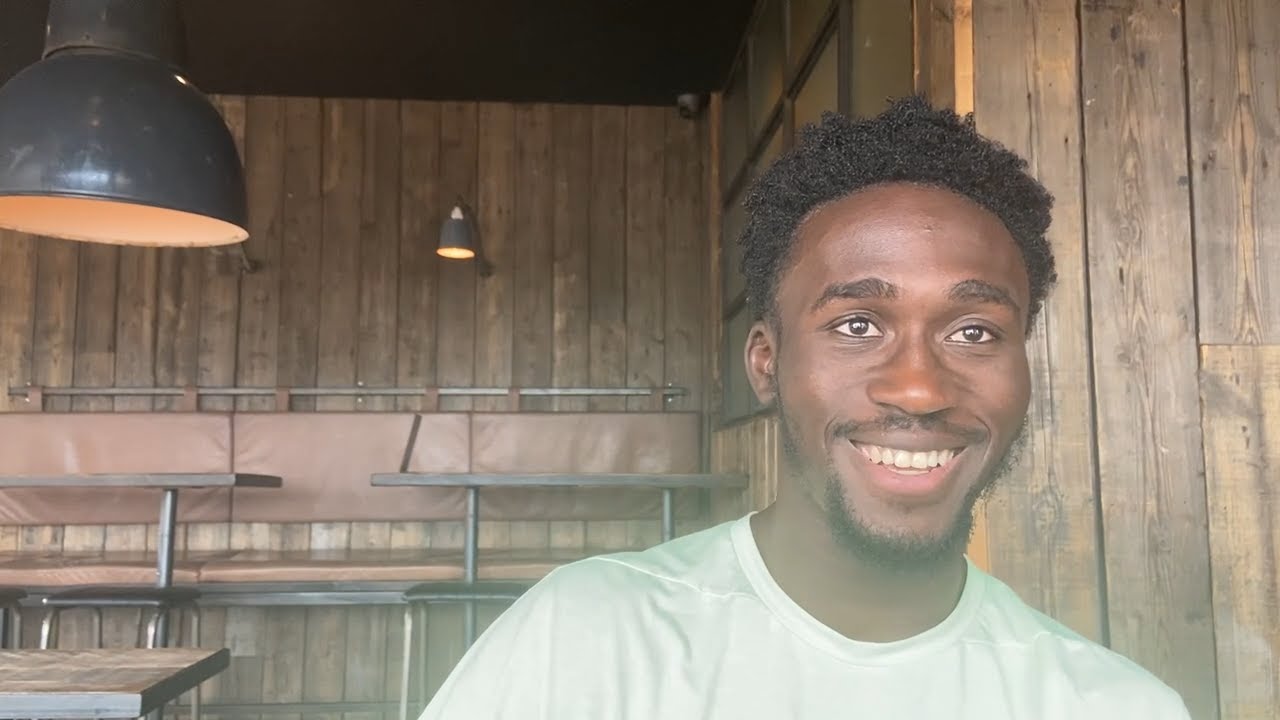Adam Olaore Taking The Green and White of Nigeria and The Black and ...