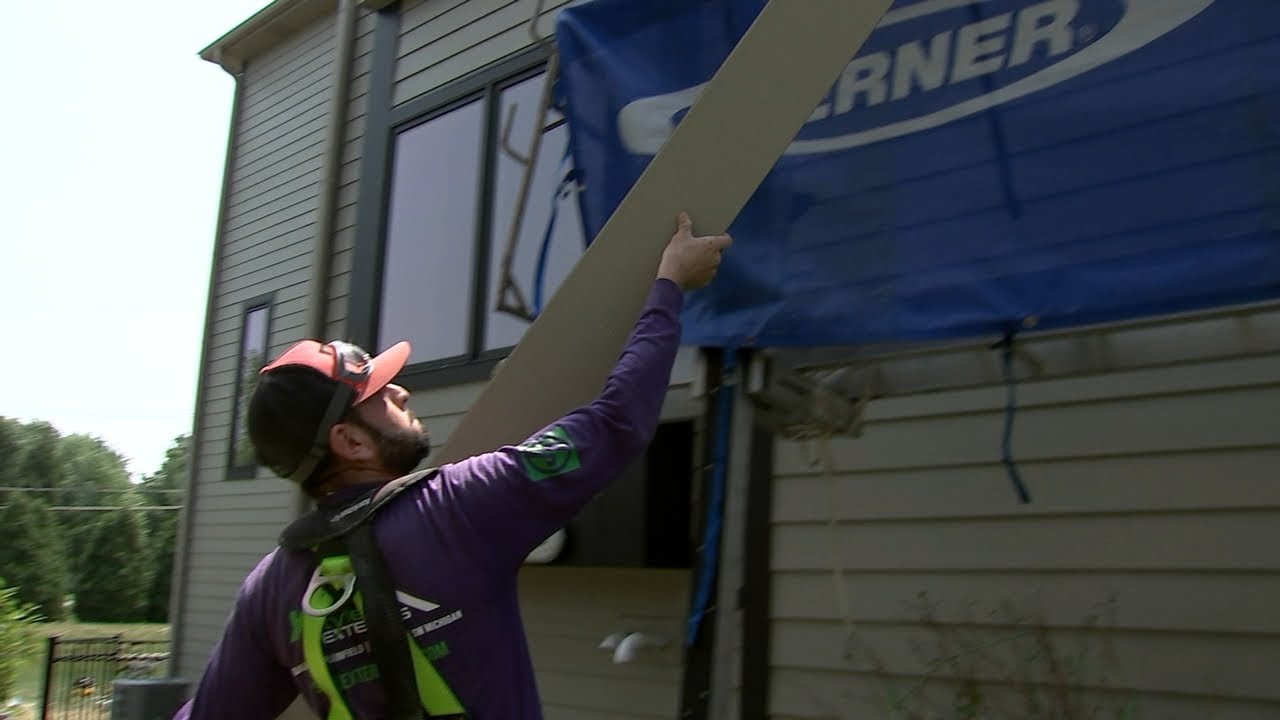 Companies step into help new Naperville homes with cracked siding - YouTube