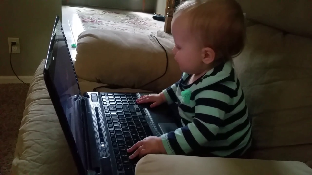 Baby hacking the mainframe - YouTube