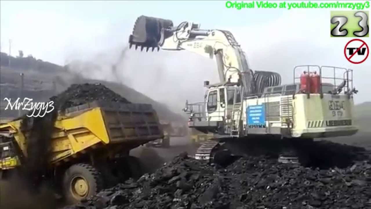Liebherr R984 Excavator Loading Komatsu HD785 Dump Truck - YouTube