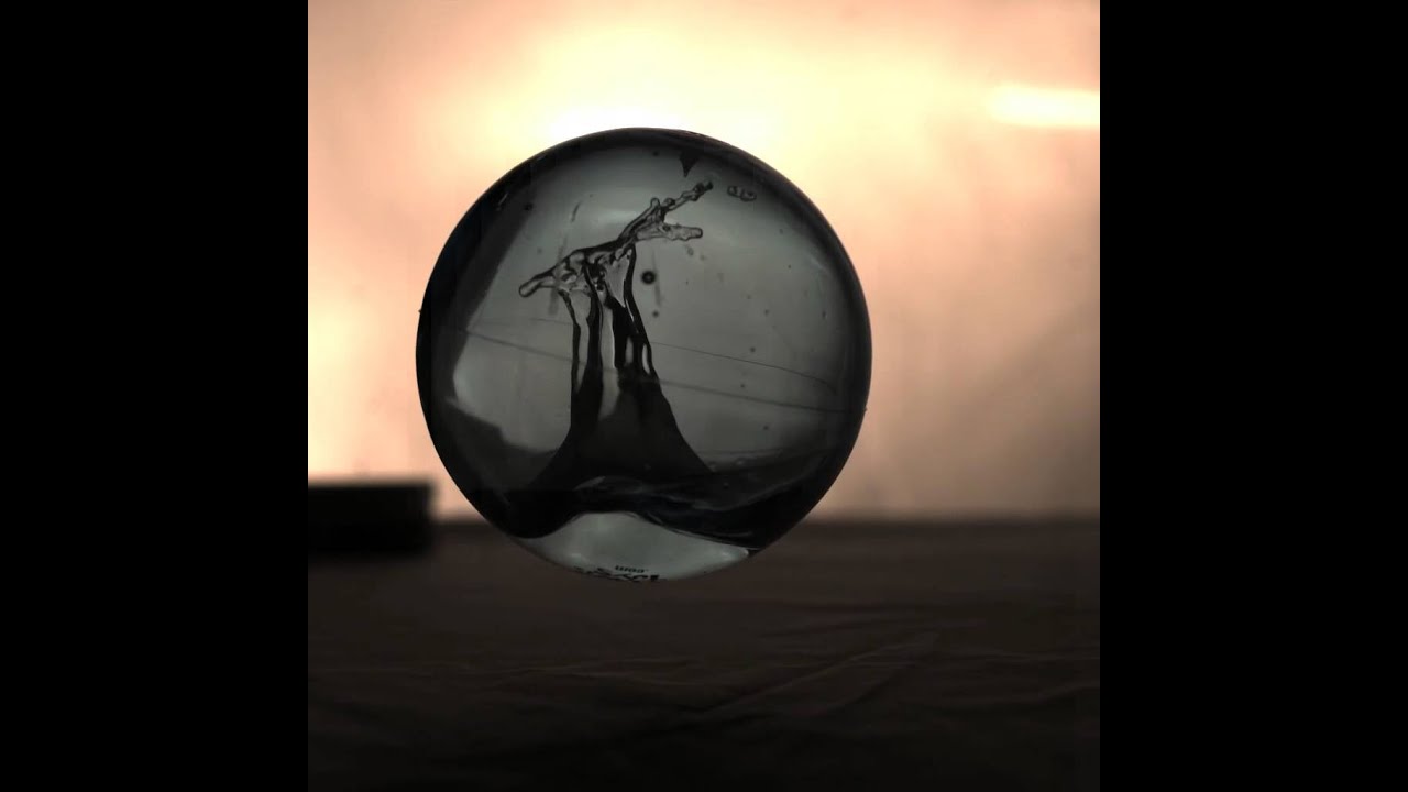 Water Sloshing in a Bouncing Sphere - YouTube