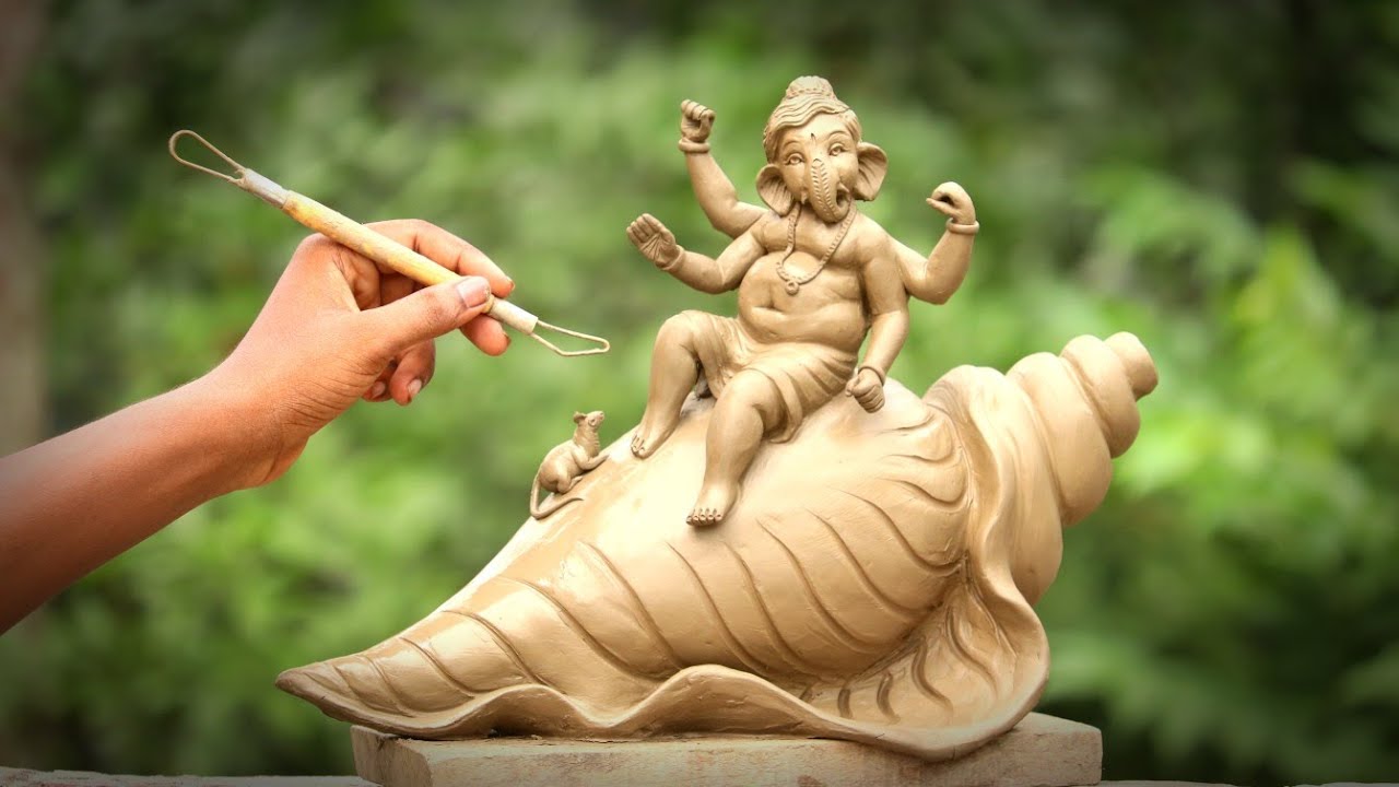 Bal Ganesha murti making on shankha | mitti ki ganesh ji ki murti ...