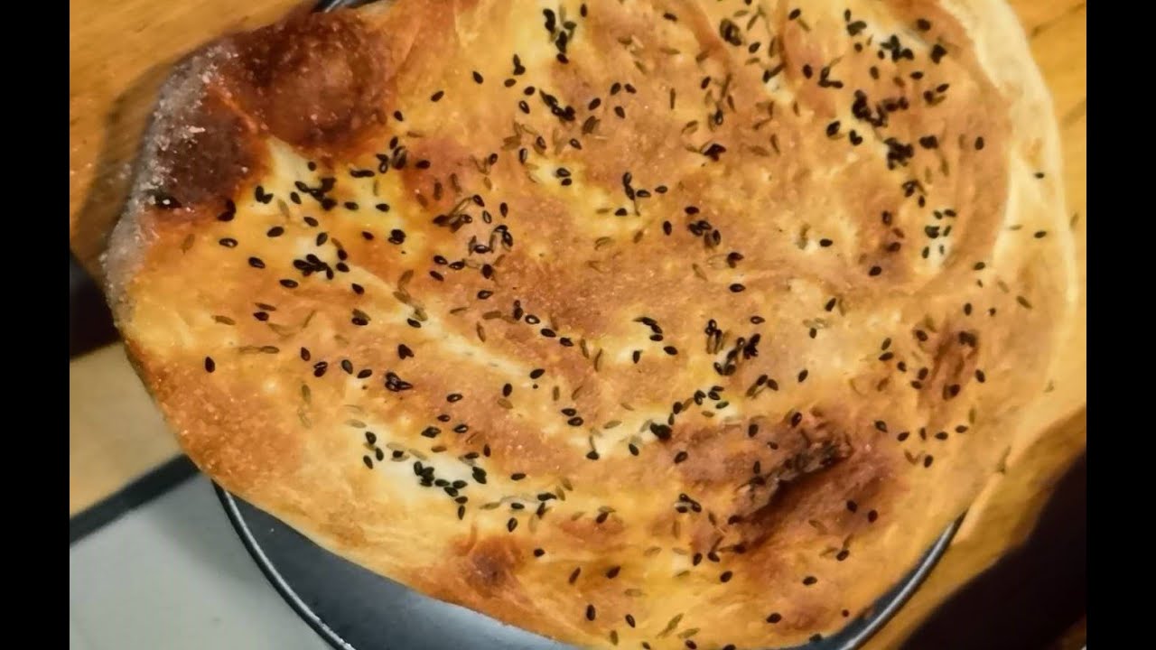 Xinjiang Naan bread in a western fireplace (ULEB) - YouTube