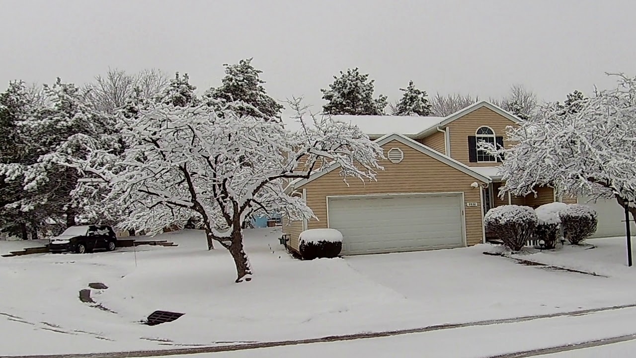 Driveway view of snowy culdesac - YouTube