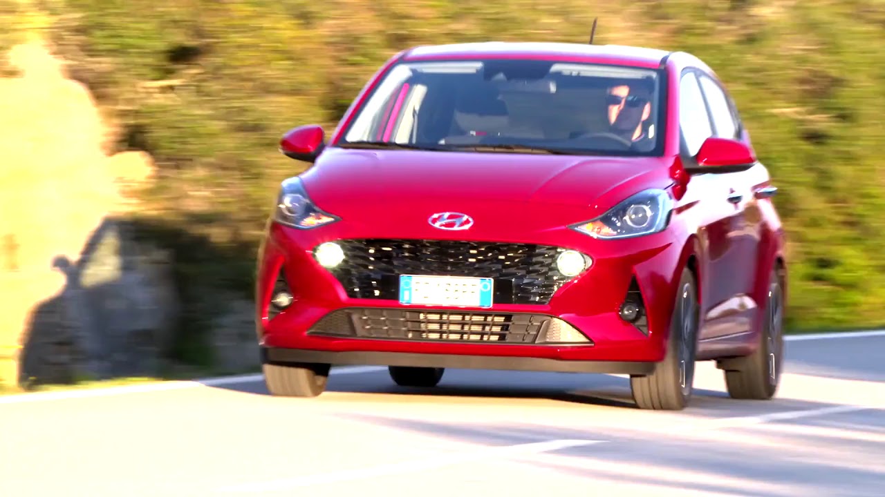 The new Hyundai i10 in Dragon Red Driving in the country - YouTube
