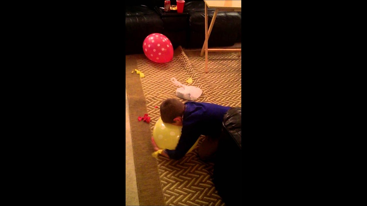 Kid on a mission! Popping balloons. - YouTube