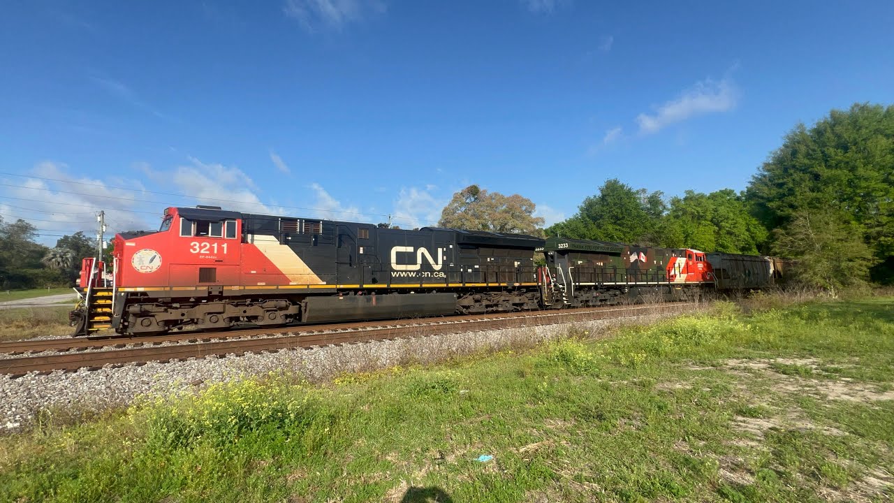 CSX B241 with CN Heritage Units 3233 & 3881 - YouTube