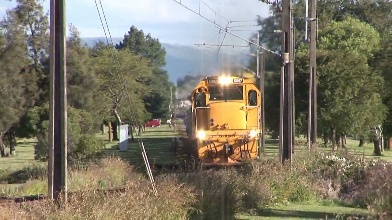 KiwiRail milk train through Feilding - YouTube
