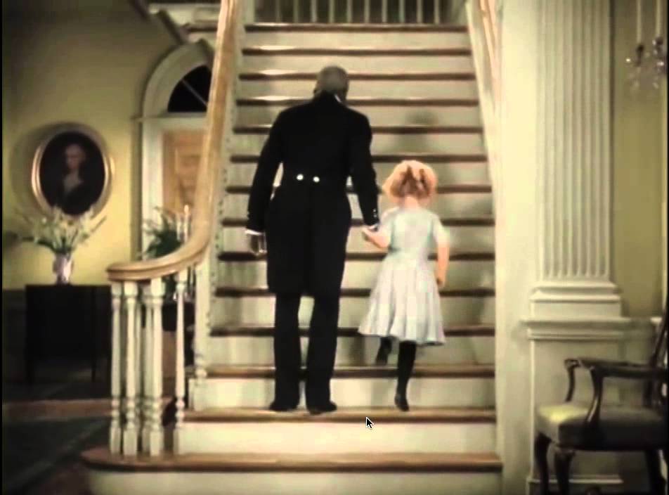 Shirley Temple dances the stairs with Bill "Bojangles" Robinson - in ...