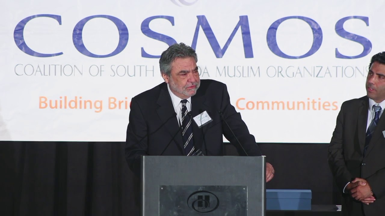 Dr Daniel Alvarez, Professor of Religious Studies at FIU accepting the ...