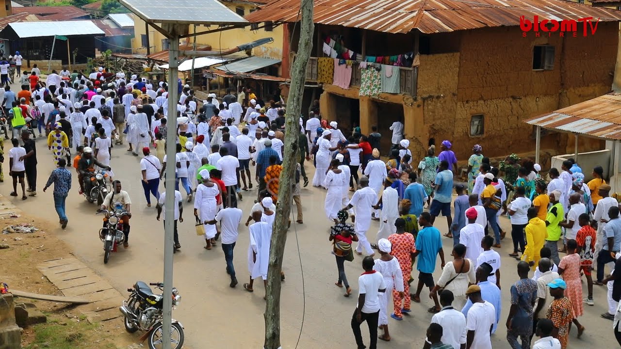 Crowd Dancing Through Igarra in Joy during 7th Day Traditional Rites of ...