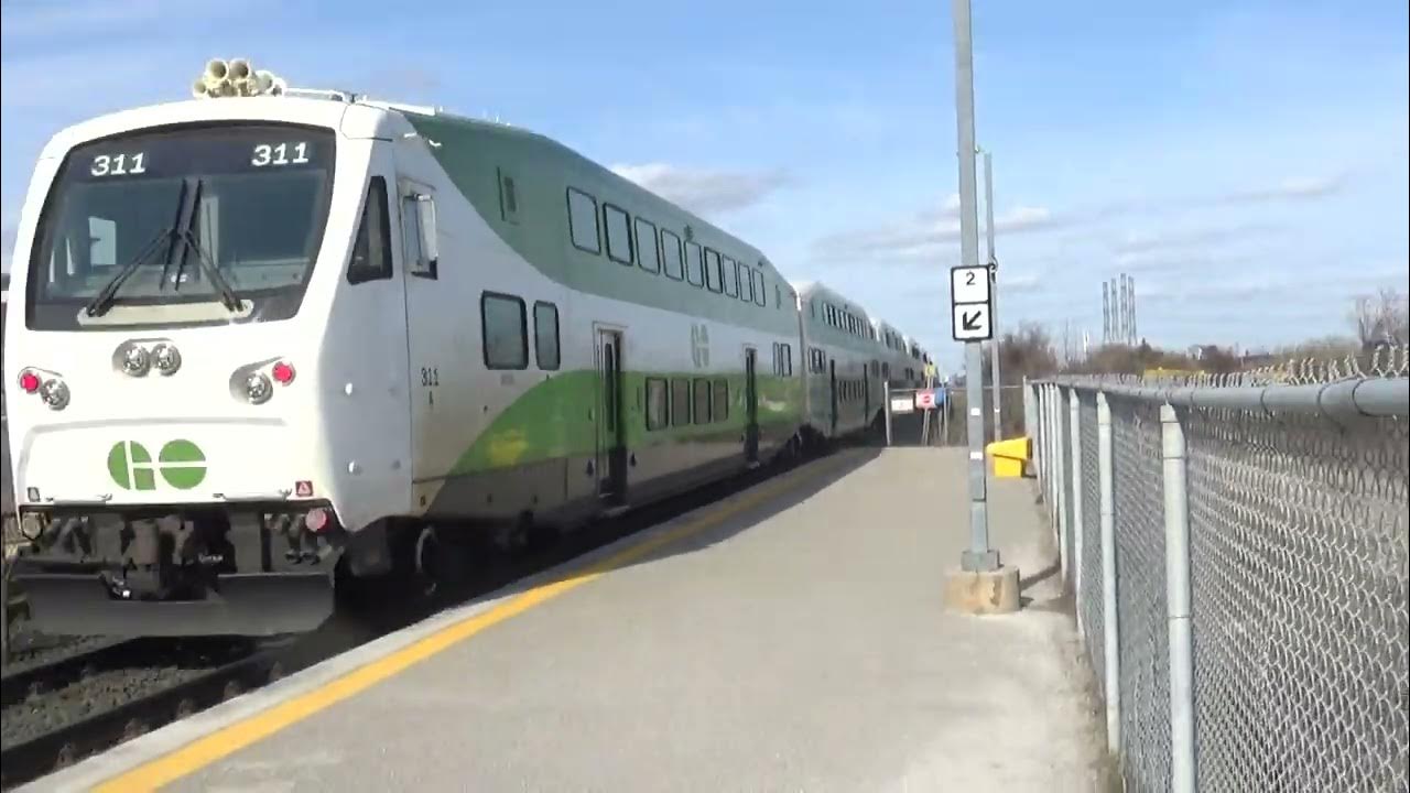 GO Transit, VIA Rail, & CN 148 intermodal stack trains meet at Pickering station. - YouTube