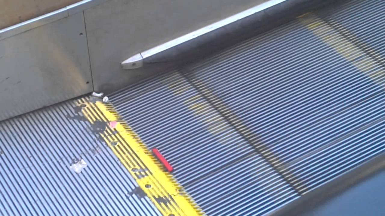 swisher wrapper exiting escalator loop - YouTube