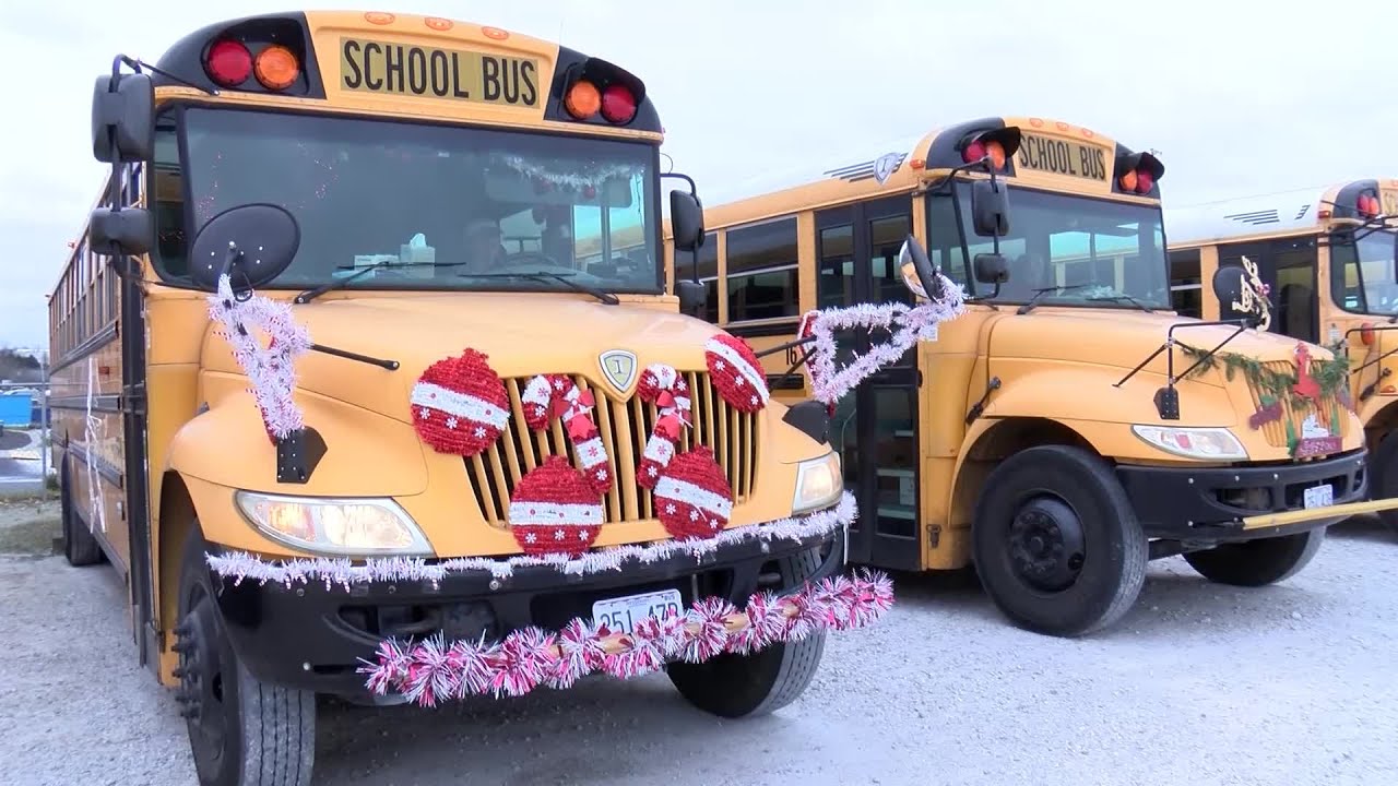 VIDEO: 24 public school buses spread Christmas cheer in Nixa - YouTube