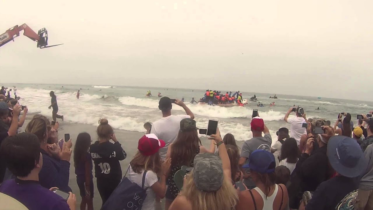 Guiness world record for most people riding a surfboard. Huntington ...