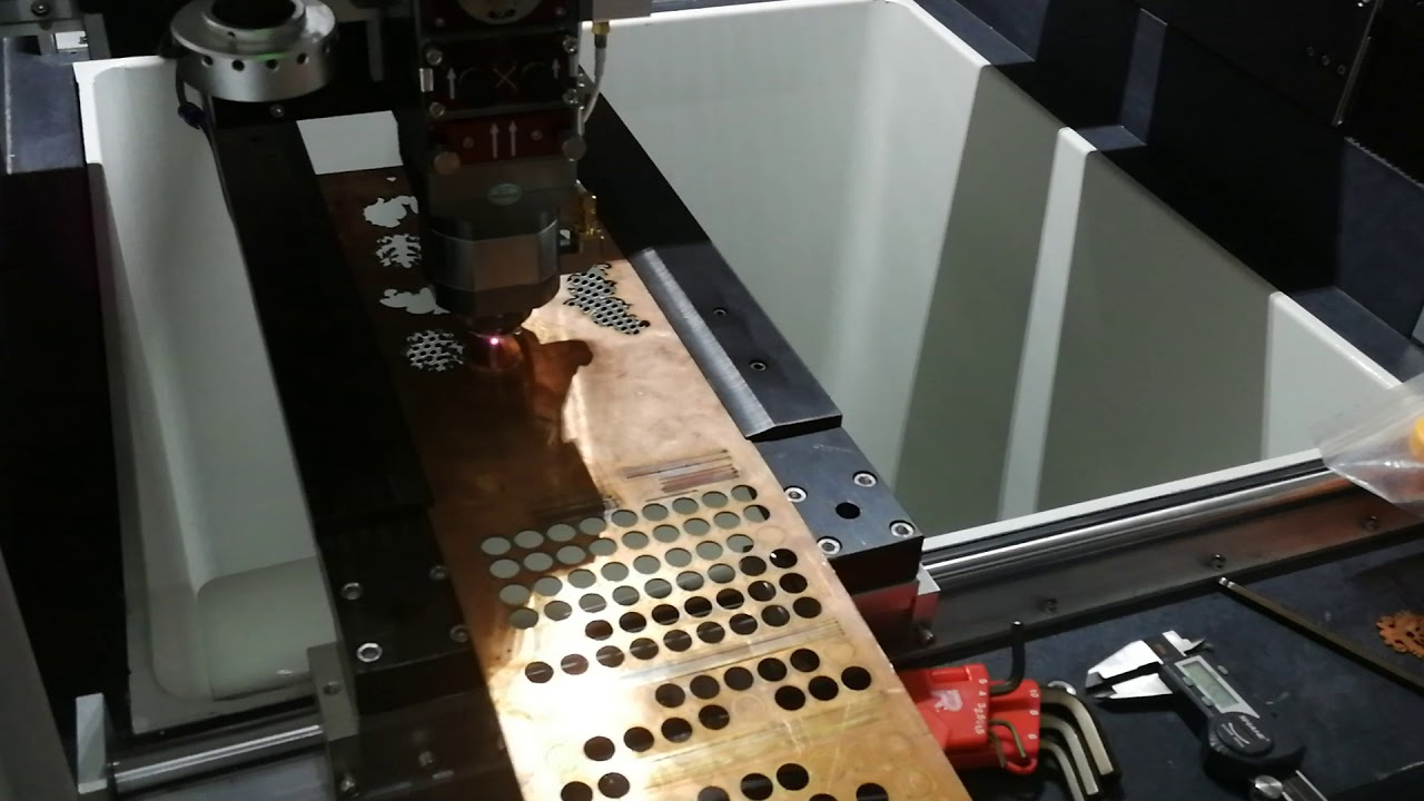 1000 watts fiber laser cutting machine with 300x300mm - YouTube