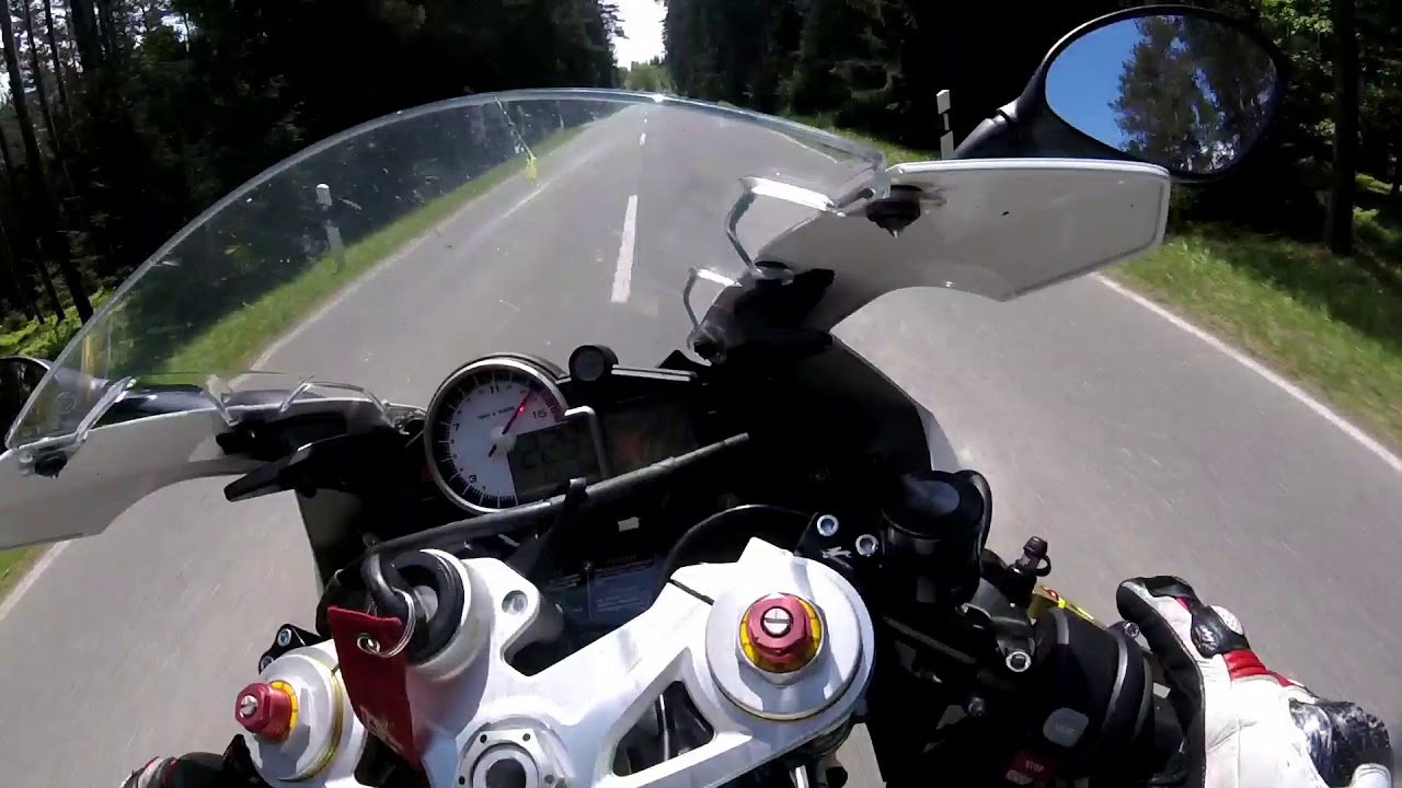 Sarah on her Yamaha R6 showing MadZiege how it's done. - YouTube