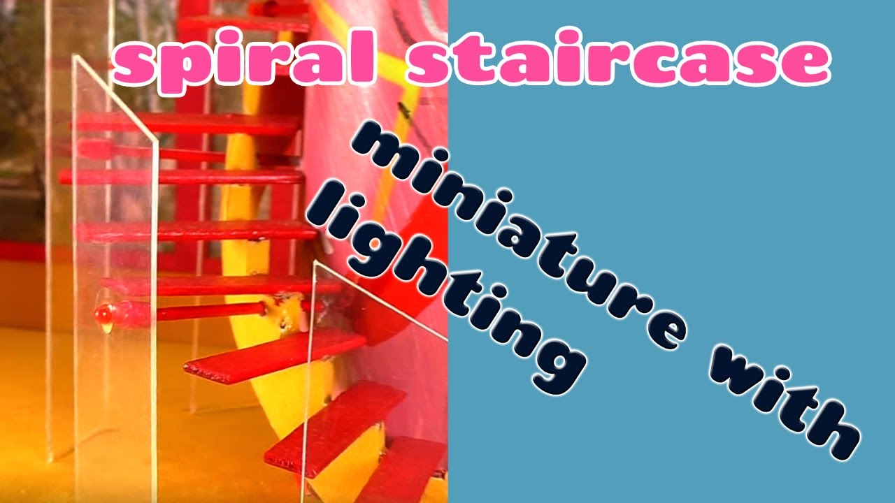 installation of a spiral staircase in a dollhouse building miniature ...