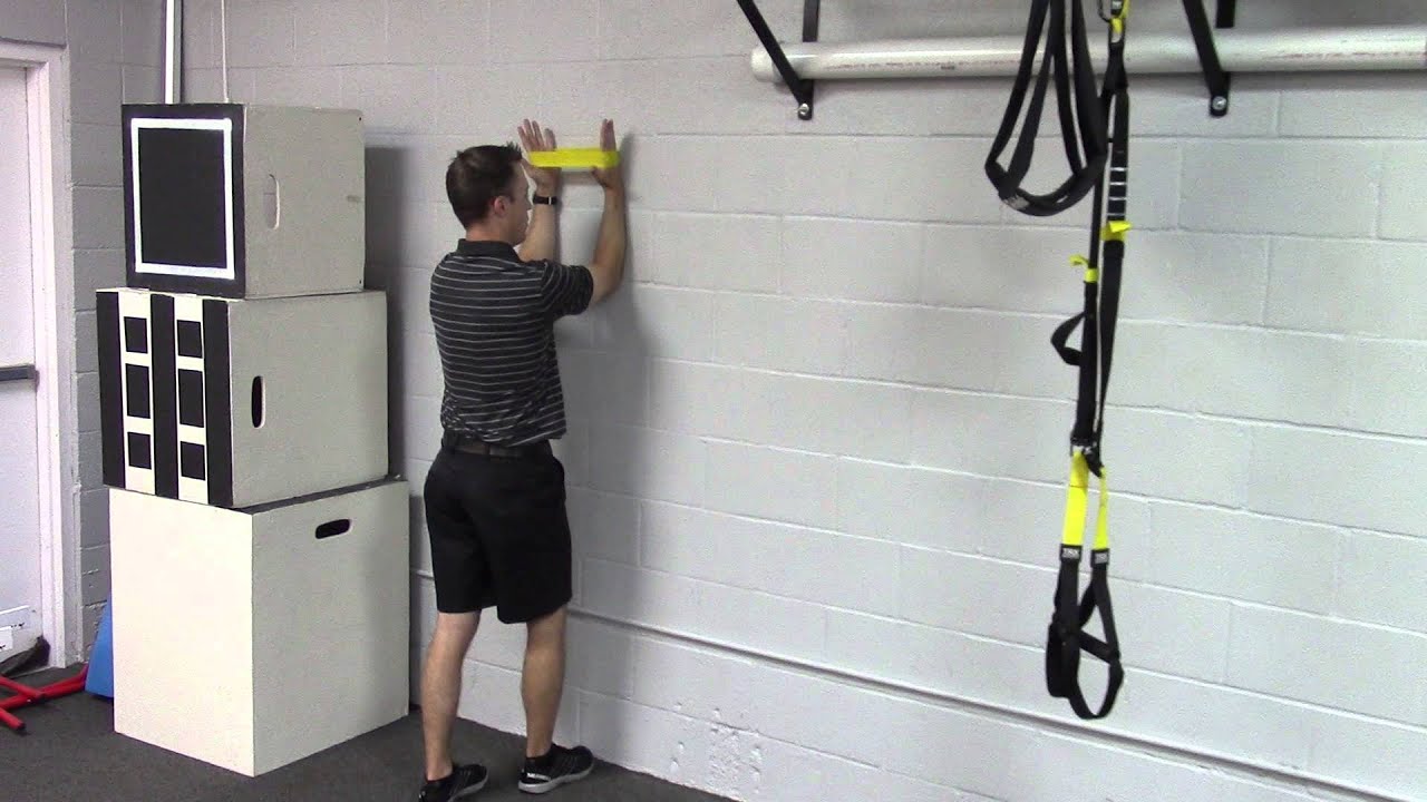 Band Resisted Wall Slides Face On - YouTube