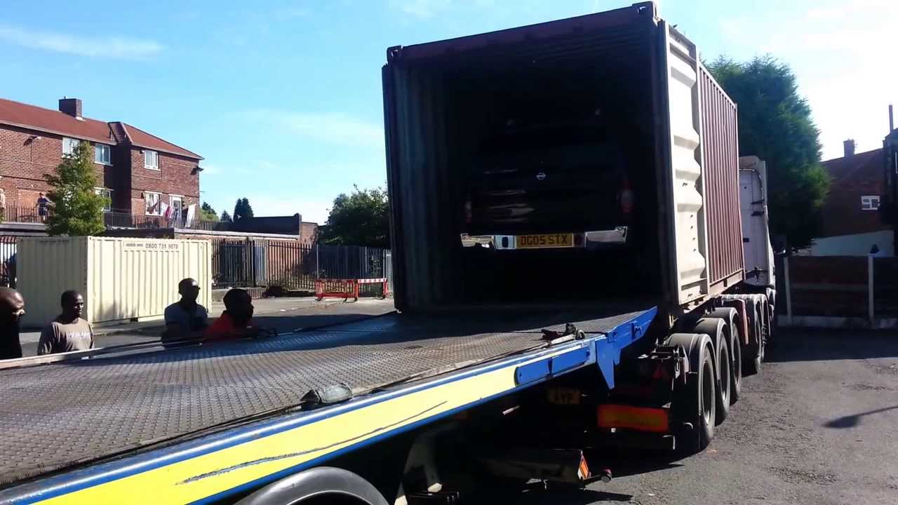 Loading a car into a container - YouTube