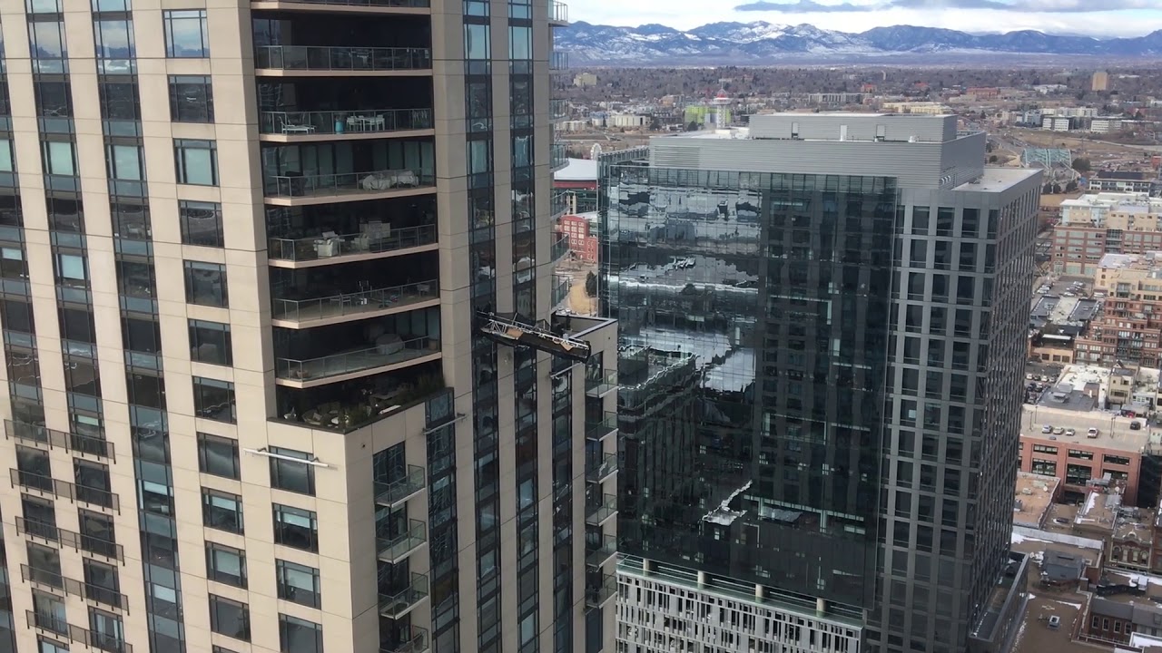 Window Washers Hang on for Dear Life as Scaffold Comes Lose From Denver ...