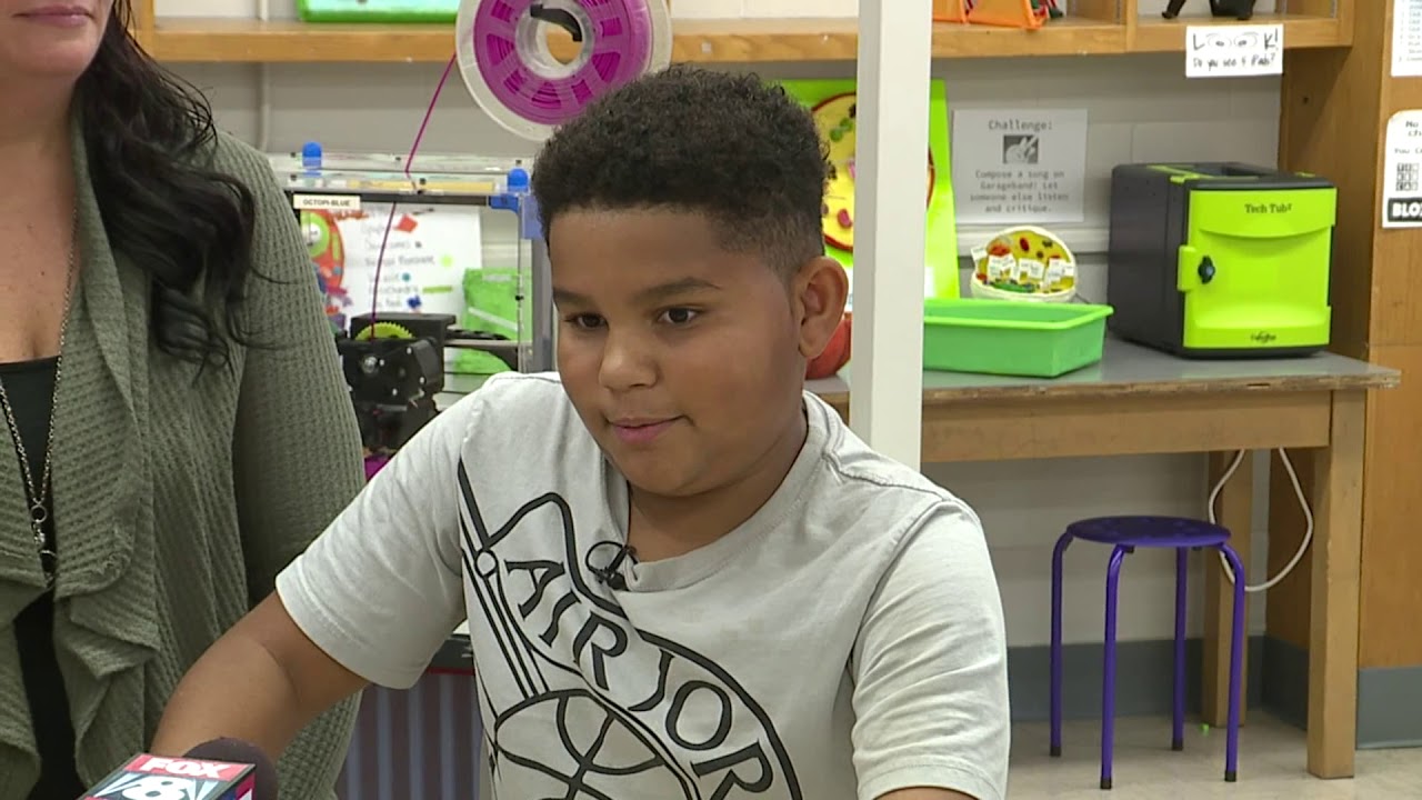 Boy gets special prosthetic to play the cello - YouTube