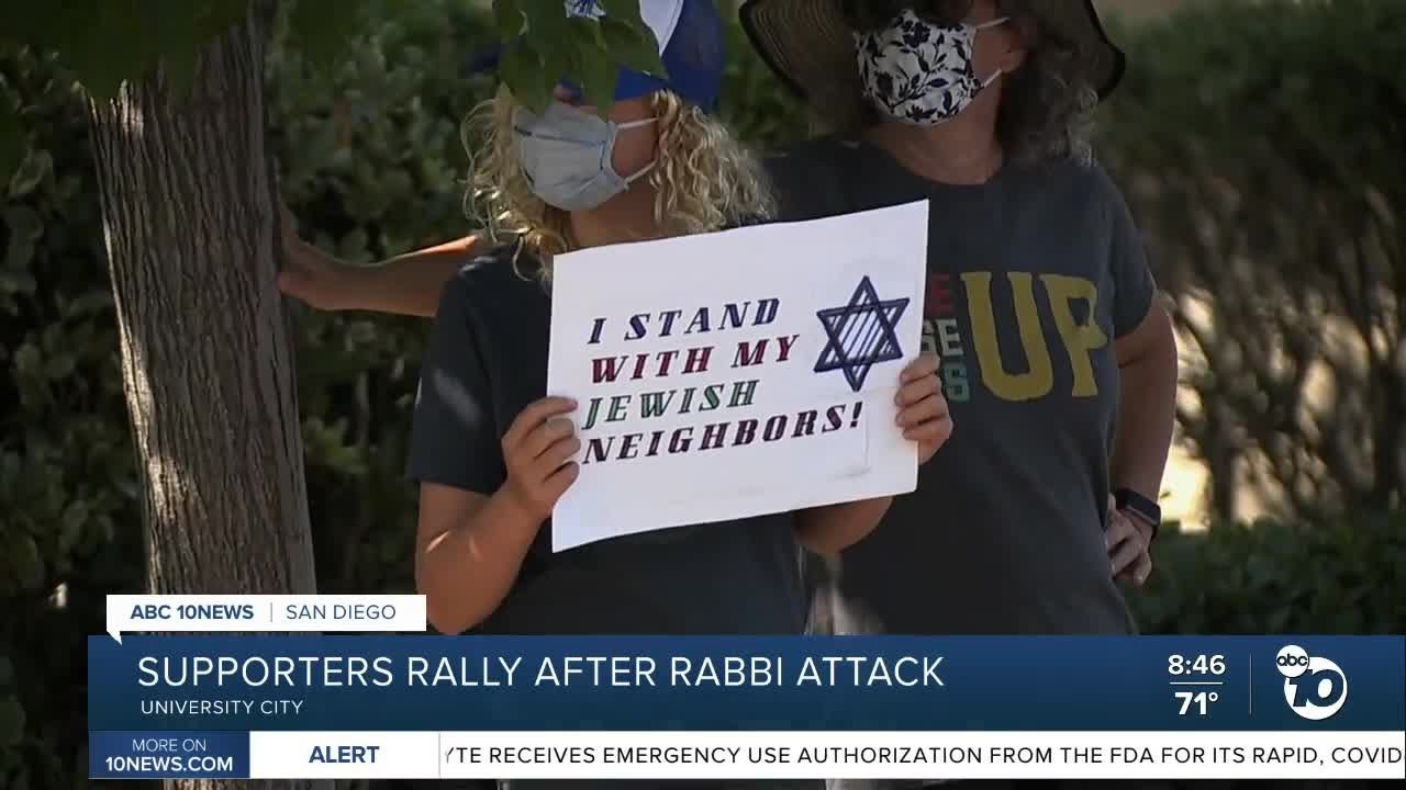 Supporters rally after Rabbi attack - YouTube
