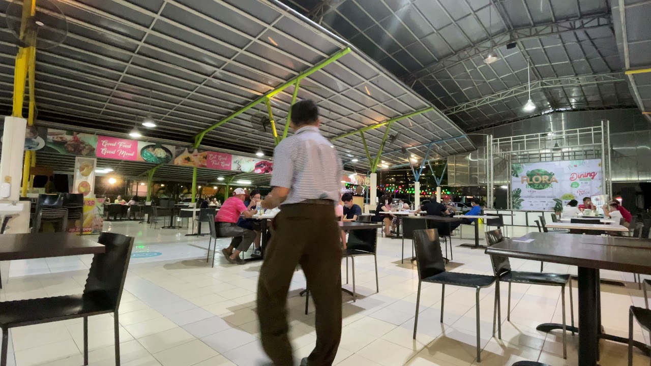 Wide Foodcourt with Food Tenants and People Walking at Night Download ...