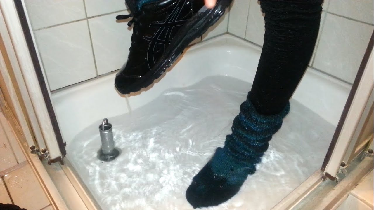Wetlook - Kristen in the shower soaking black sneakers and large woolen ...