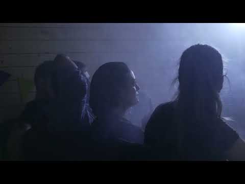 Group of People at Counter smoking for Emerald Leaves