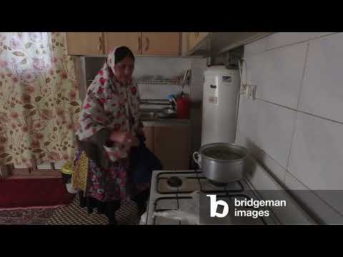 Iranian Woman in Floral Chador - Abyaneh, Iran