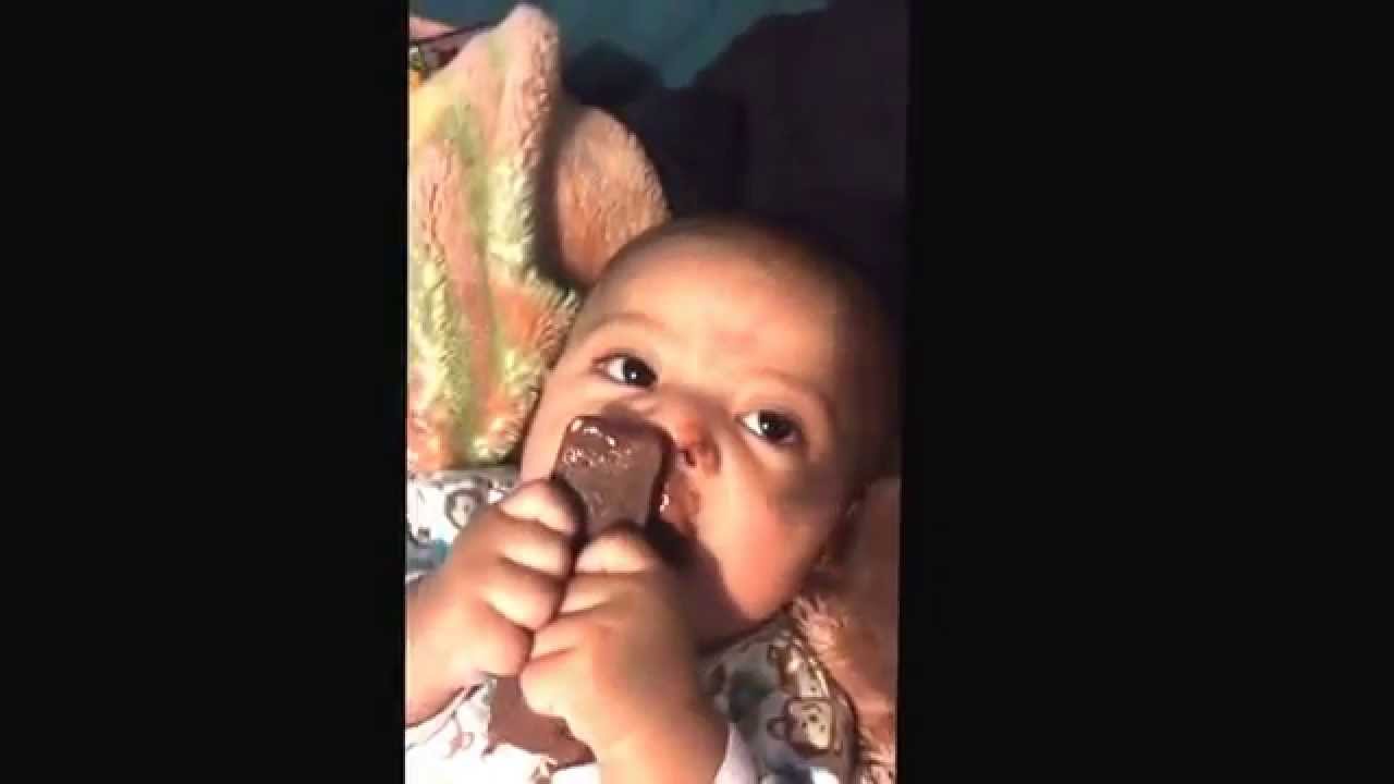 Fat baby eating a snicker bar. Smh - YouTube