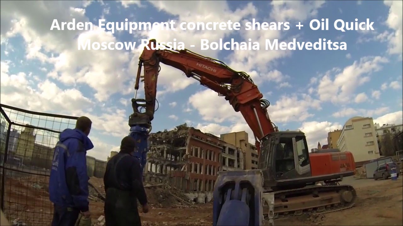 Arden demolition equipment with a automatic quick hitch Oil Quick - YouTube