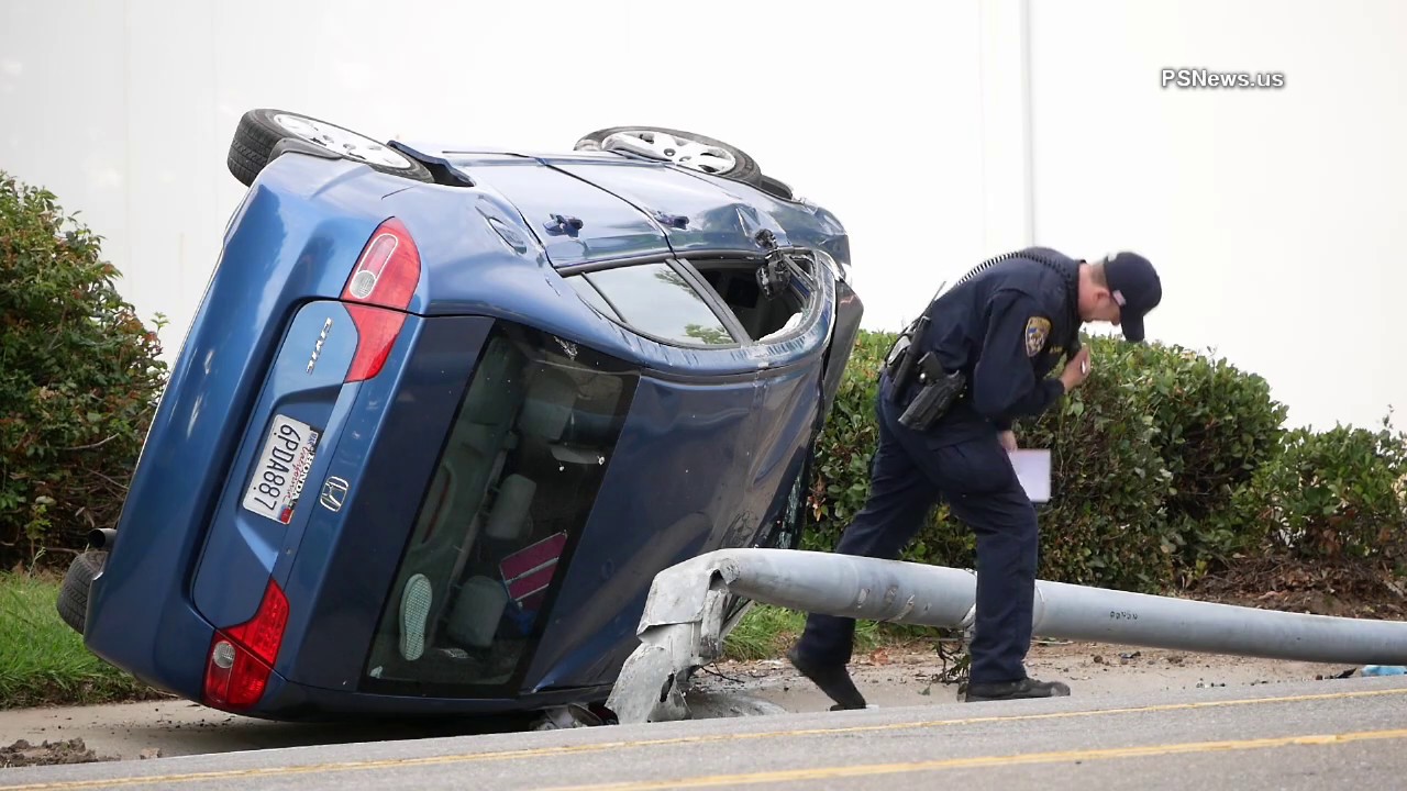 Car crashes into pole and flips over along Roseville Rd, North ...