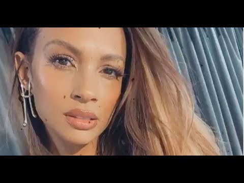 BGT's Alesha Dixon flashes bra as denim playsuit falls open in risqué display