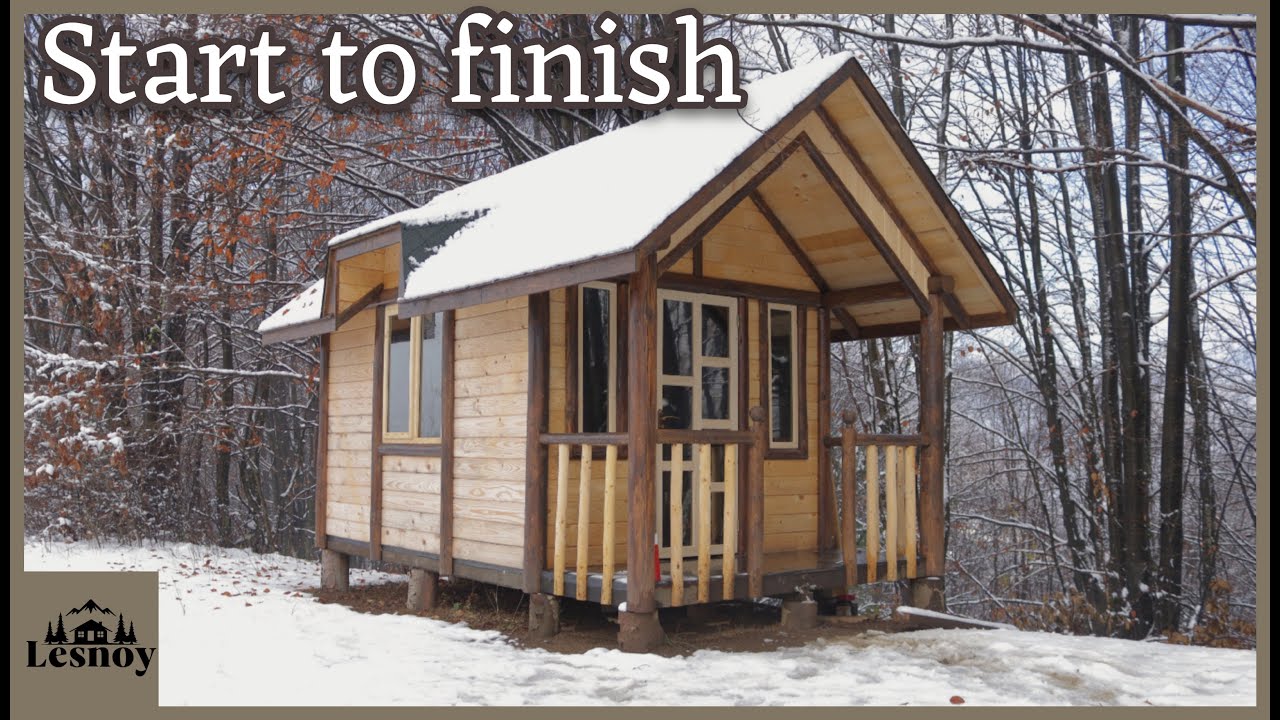 Building of a Bushcraft wooden cabin for living in nature. Start to ...