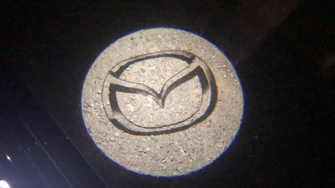 New Mazda 3 2019 biggest puddle light question - YouTube
